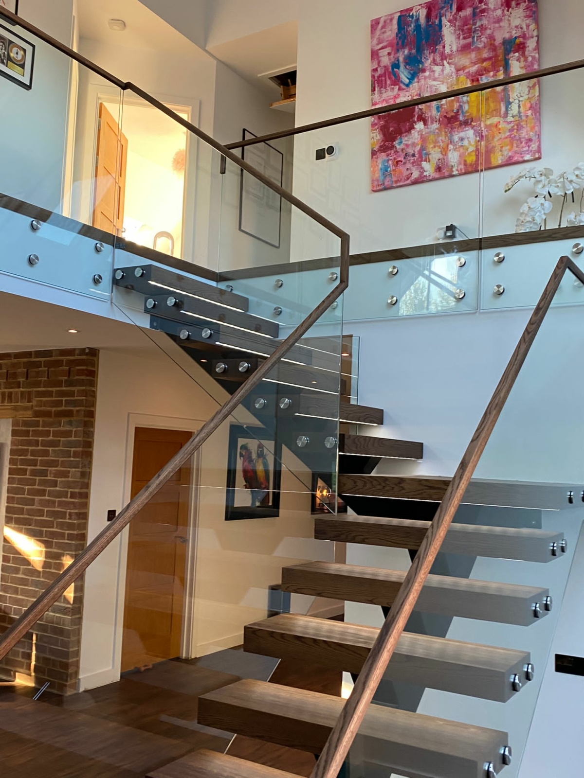 Central Spine Staircase with Glass Balustrade and Oak Handrail - DDC London