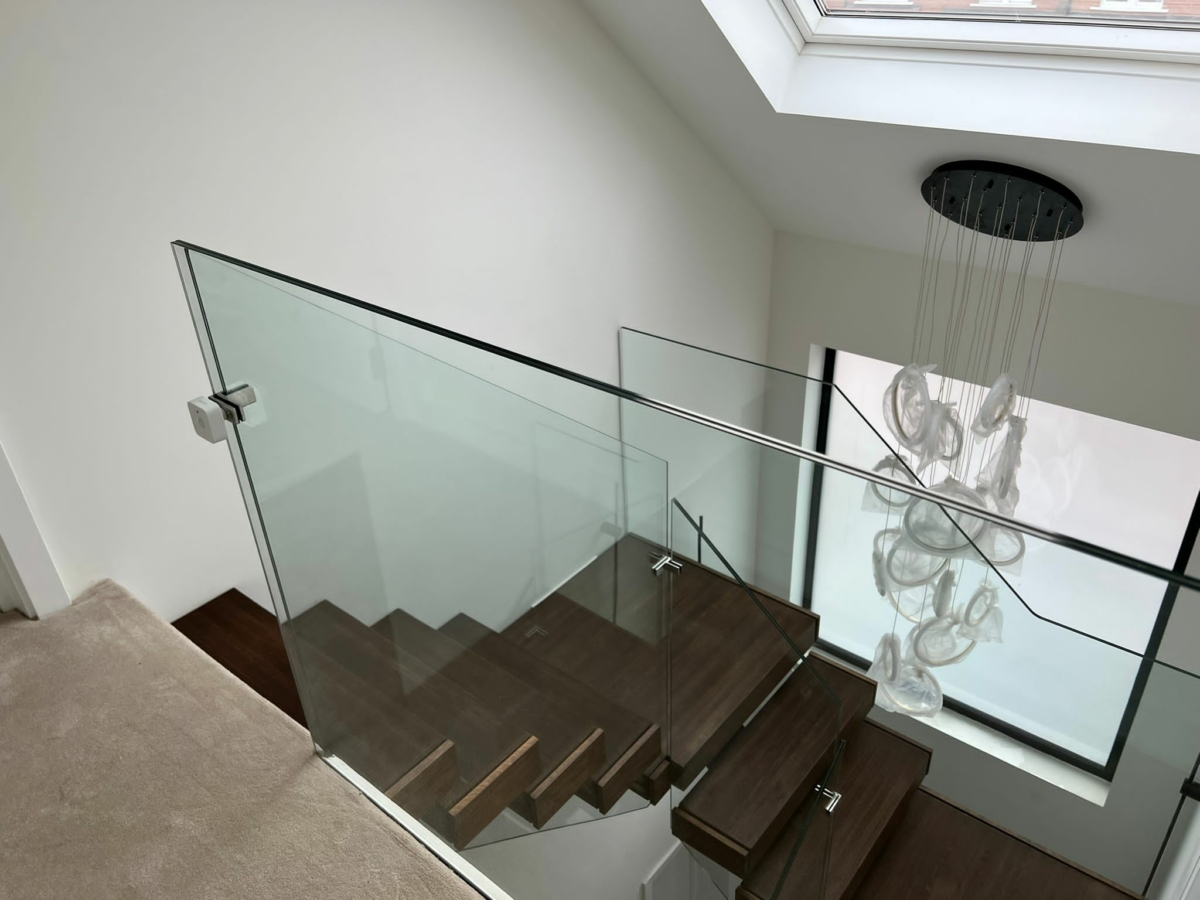 Central Spine U-Shape Staircase with Frameless Glass Balustrade and ...