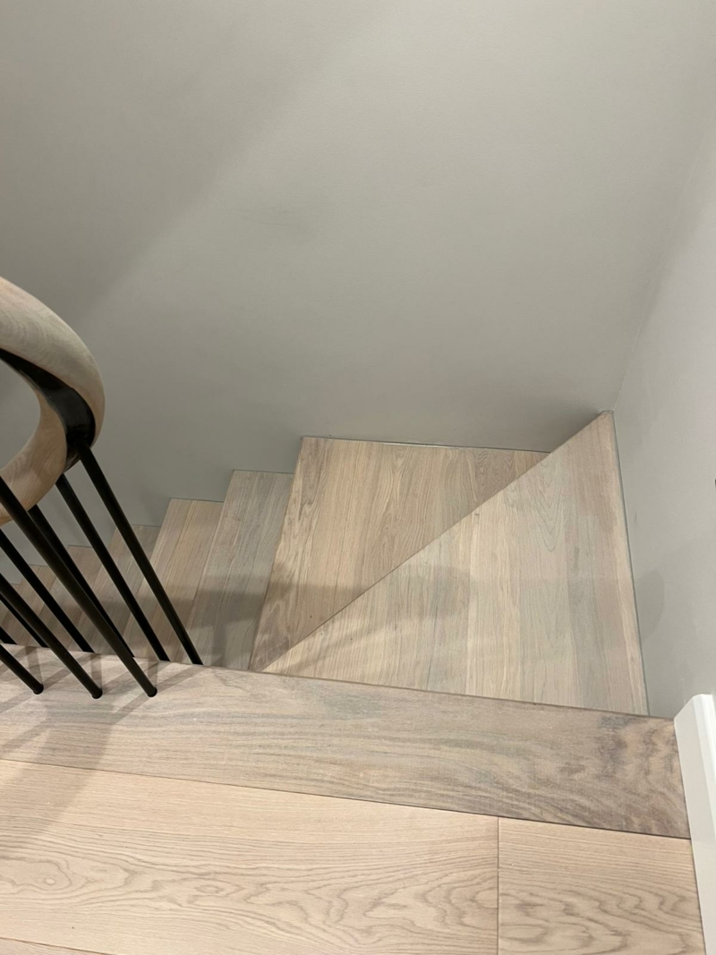 Closed Tread Staircase with Metal Spindles and Light Brown Oak Handrail ...