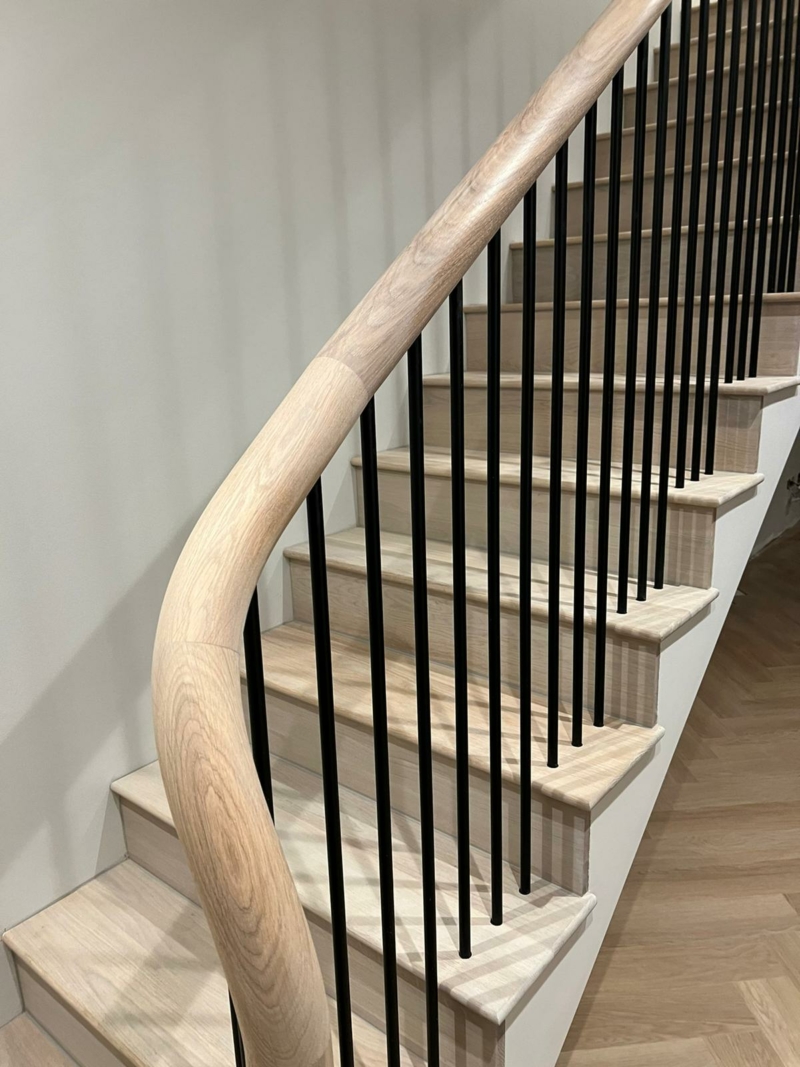 Closed Tread Staircase with Metal Spindles and Light Brown Oak Handrail ...