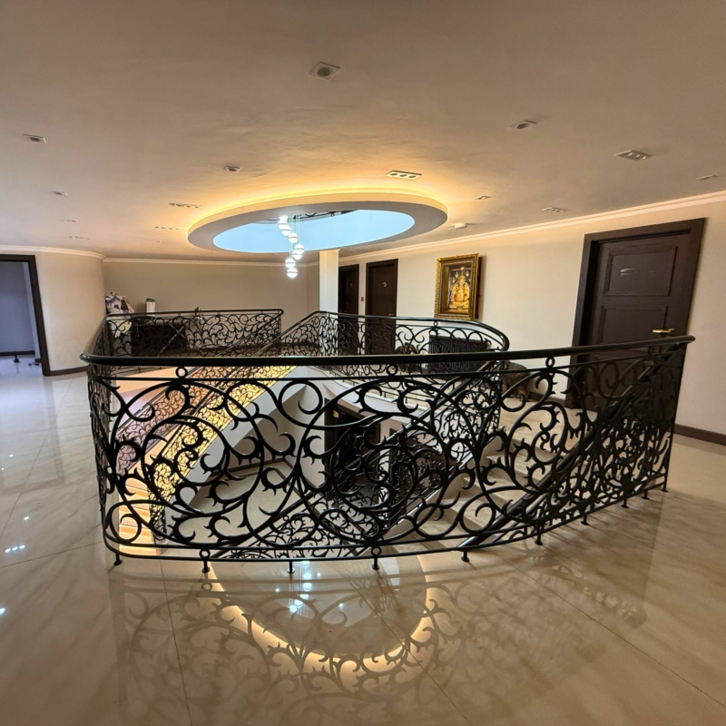 Curved Bespoke Staircase with LED Lights and Lasered Cut Balustrade ...