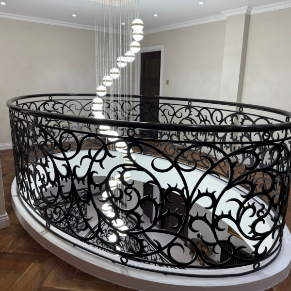 Curved Bespoke Staircase with LED Lights and Lasered Cut Balustrade ...