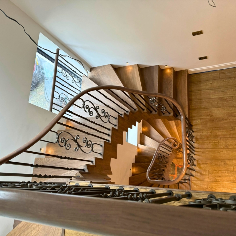 Curved Staircase with Metal Balustrades - DDC London