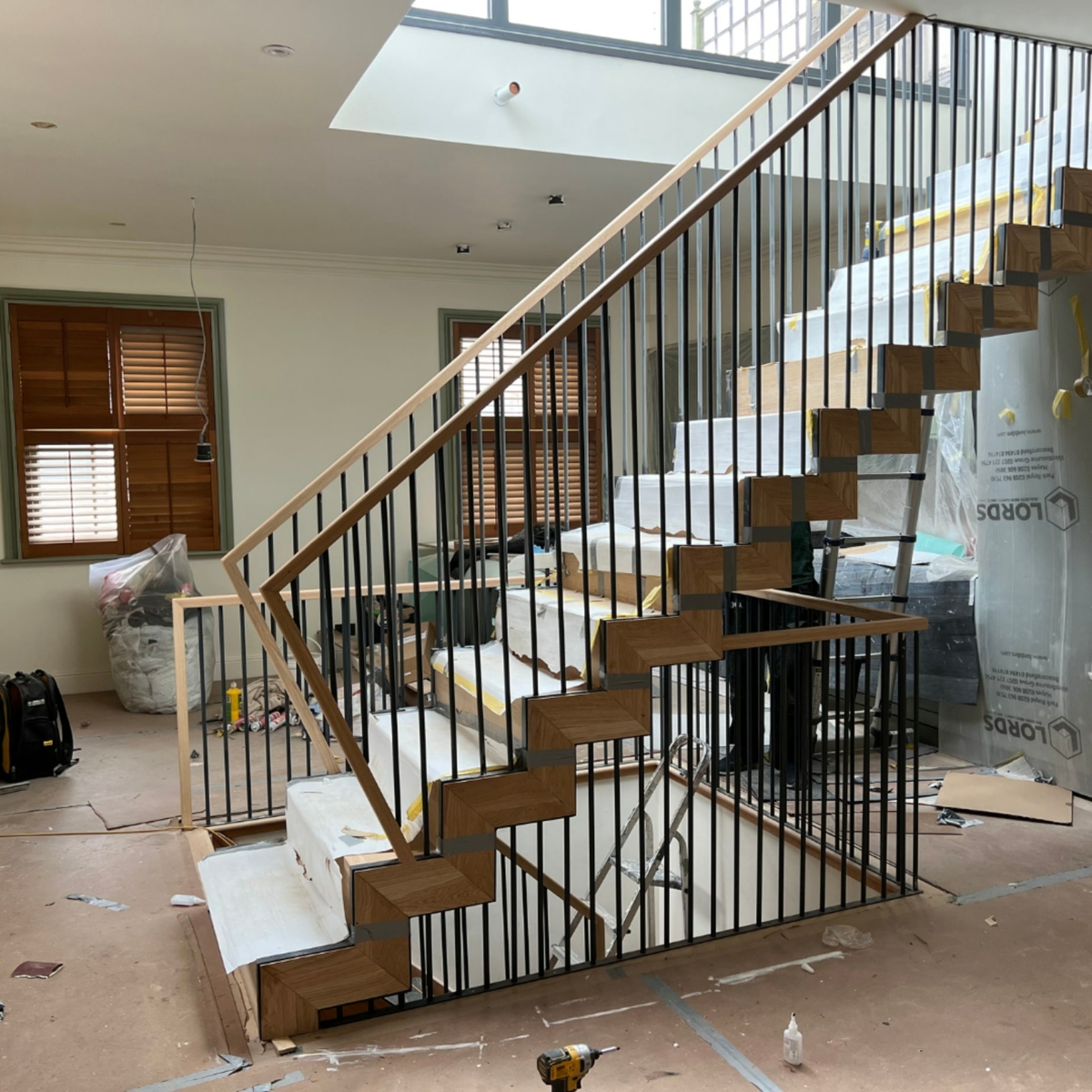 Modern Zigzag Staircase with Oak and Metal Detailing - DDC London